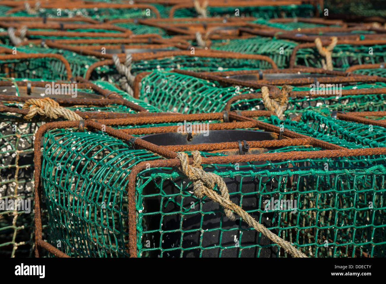 Fishing traps stacked in a fishing area of Ribadesella village Stock ...