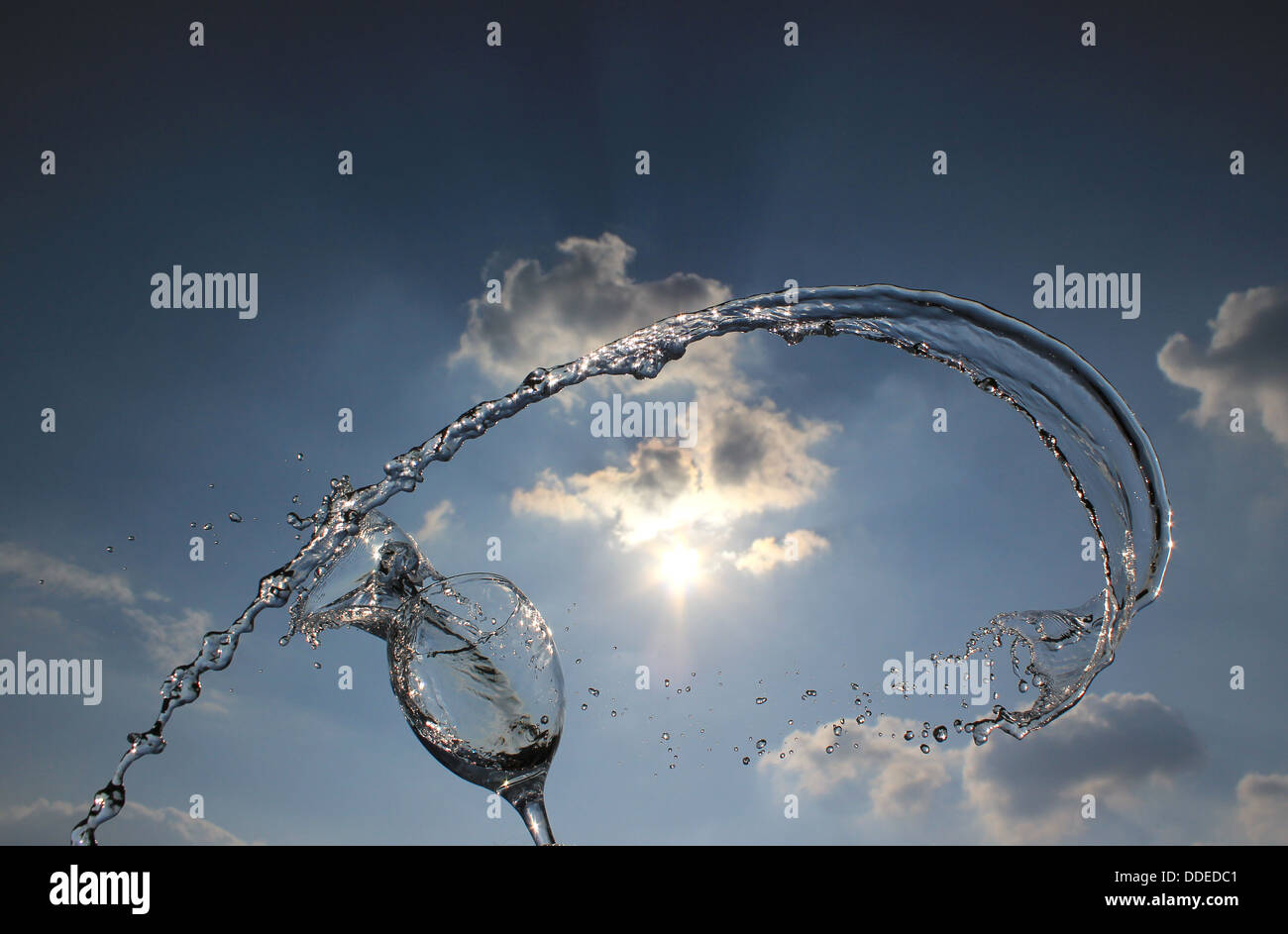 Water splashing from wine glass Stock Photo - Alamy