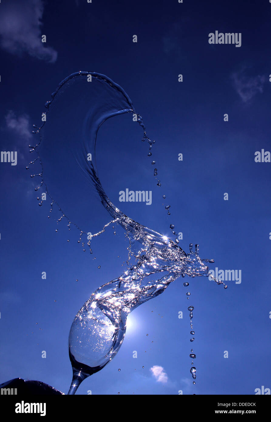 Water splashing from wine glass Stock Photo - Alamy