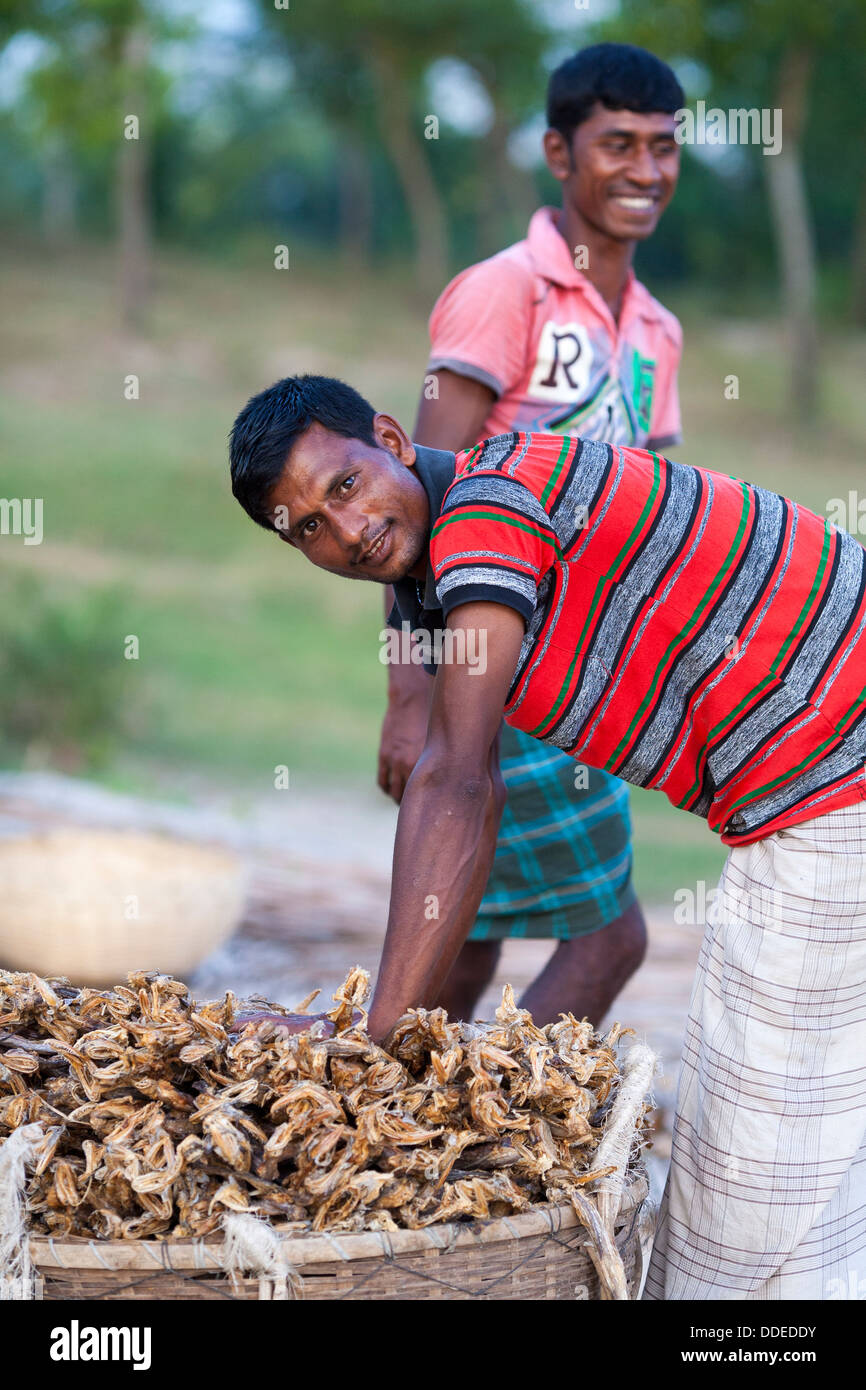 Asia men drying fish men hi-res stock photography and images - Alamy