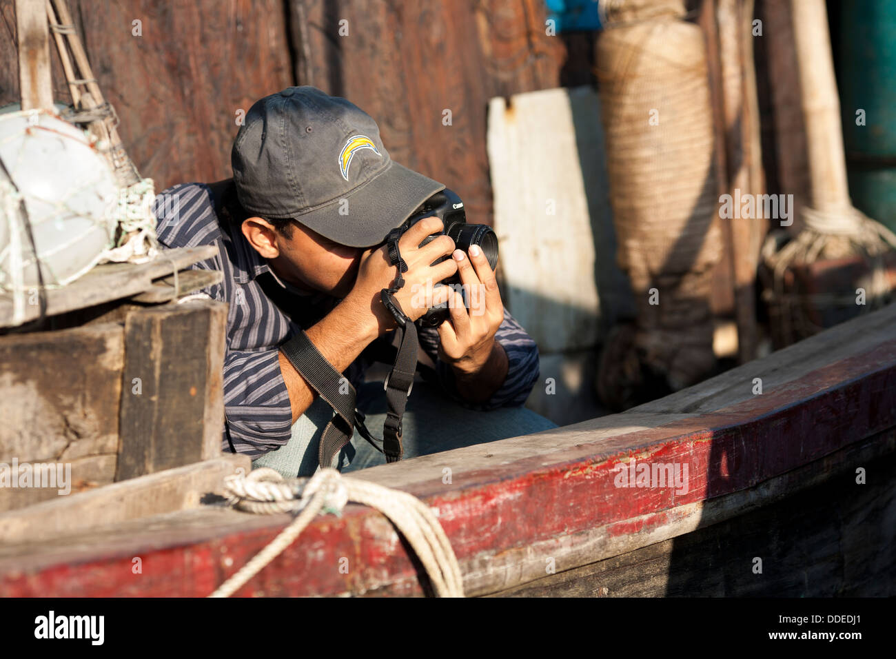A photographer takes photographs of life on a fishing boat in ...