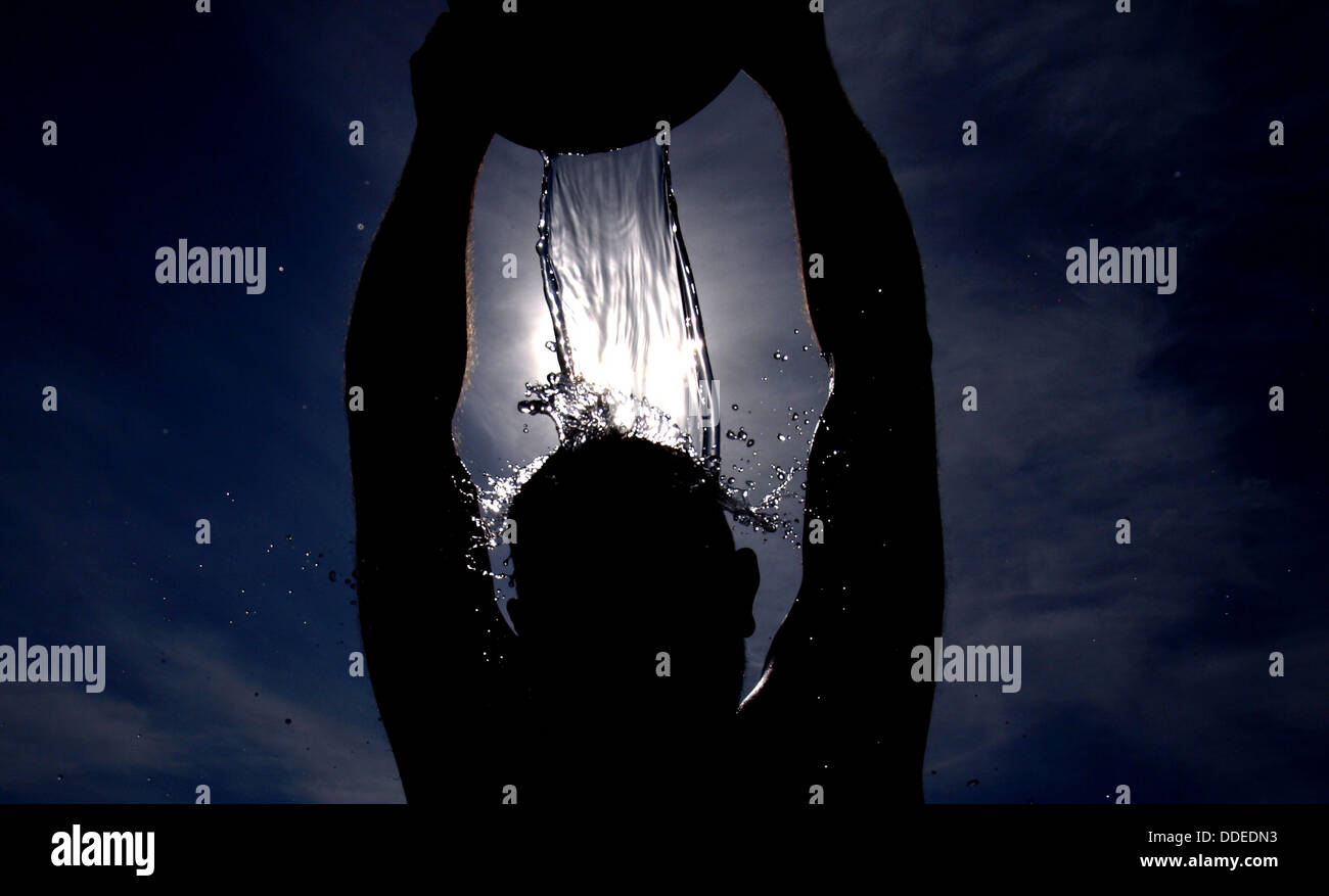 Man bucket water hi-res stock photography and images - Alamy