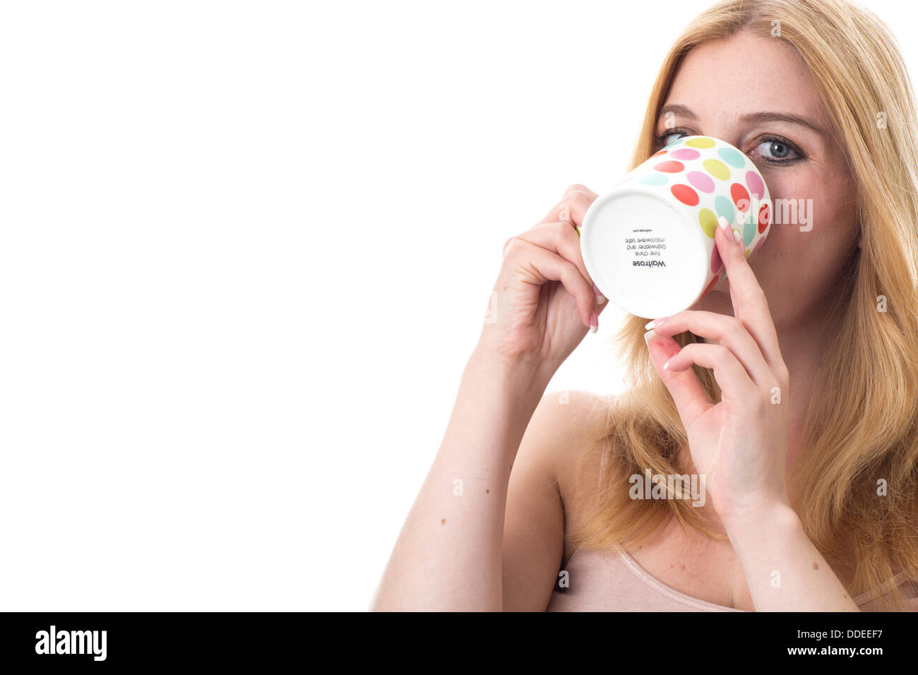 Model Released. Attractive Young Woman Drinking Coffee Stock Photo - Alamy