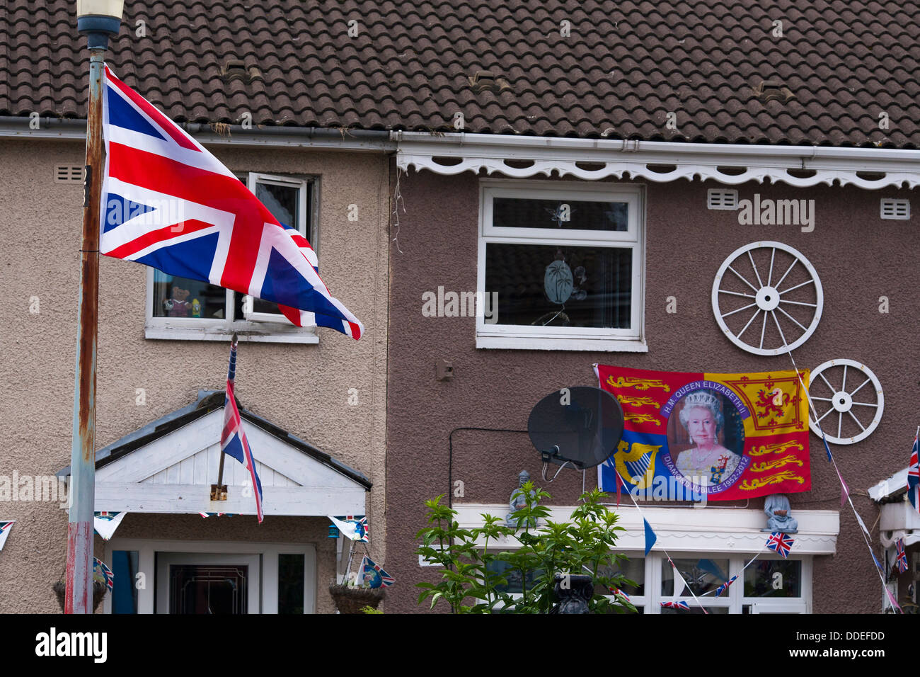 A Union Jack flag flies from a house on a housing estate in Protestant ...