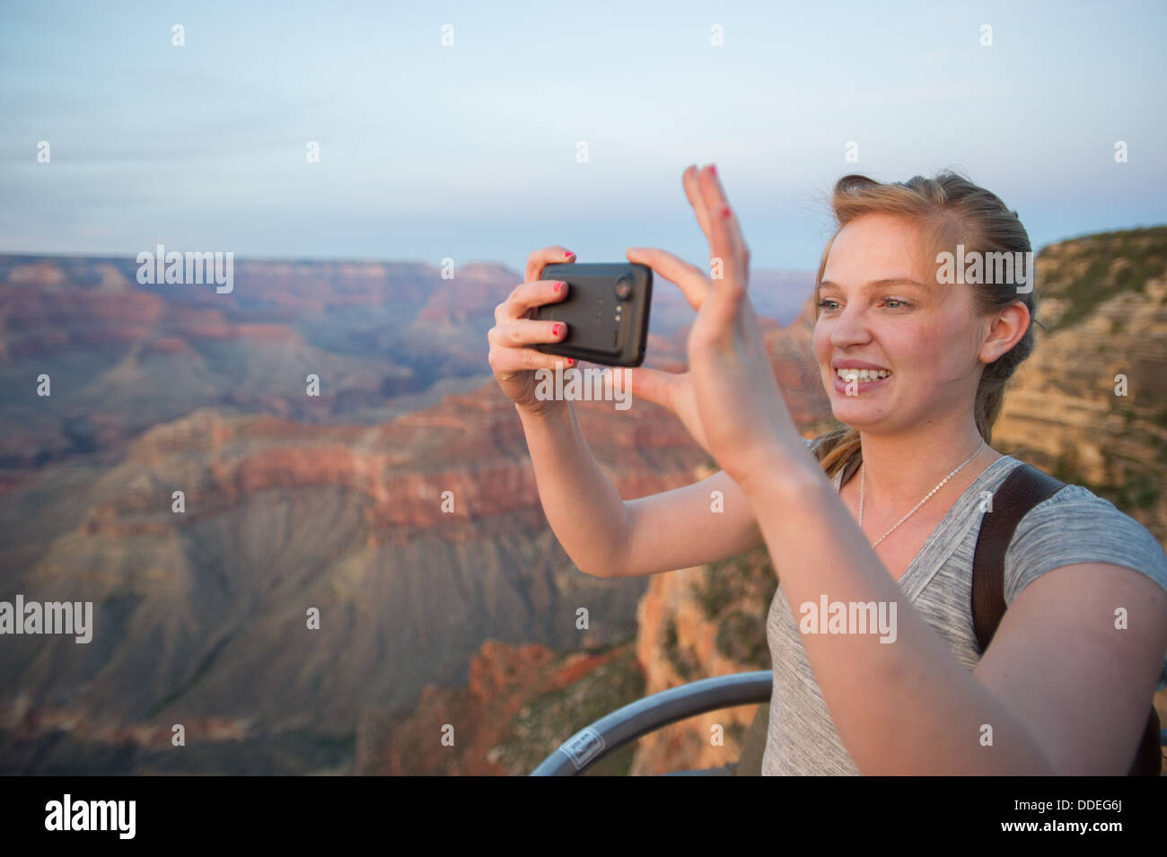 Young woman taking cellphone hi-res stock photography and images - Alamy