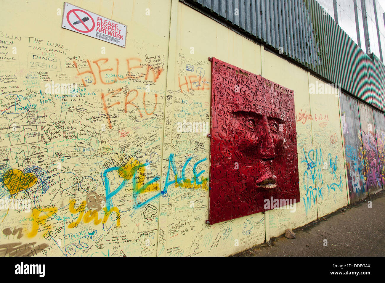 The peace wall in west Belfast keep the catholics and Protestants from ...