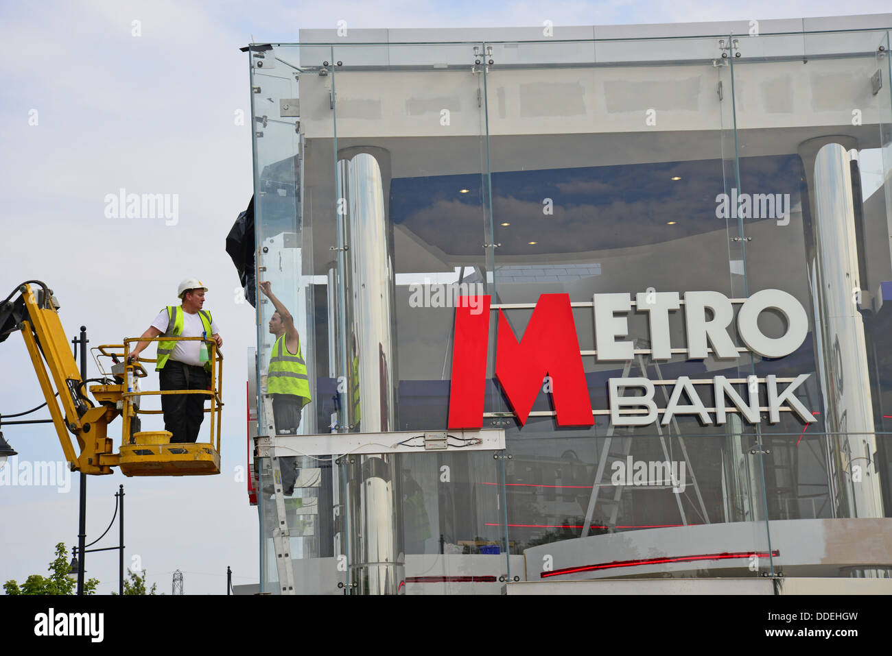 Construction workers building new Metro Bank, Two Rivers shopping ...