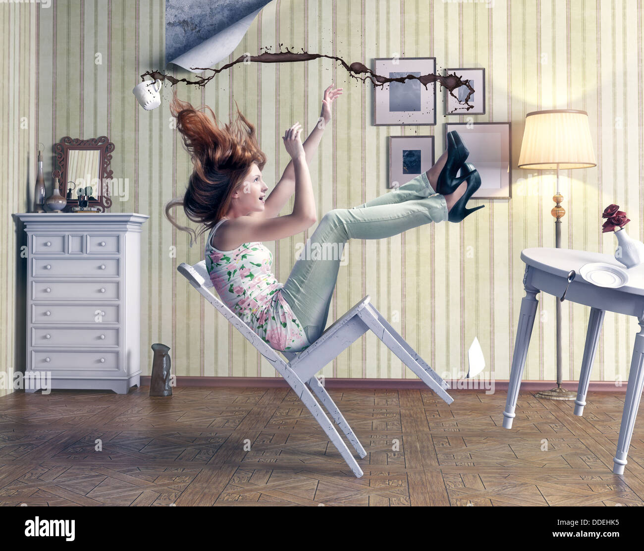 girl falls from a chair in vintage room Stock Photo - Alamy