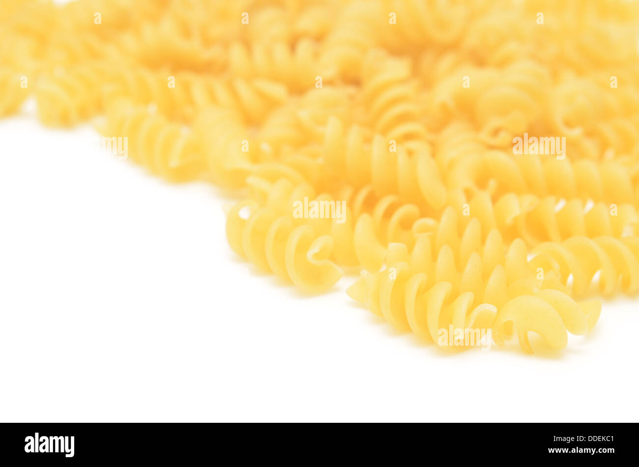 raw pasta isolated on white Stock Photo - Alamy
