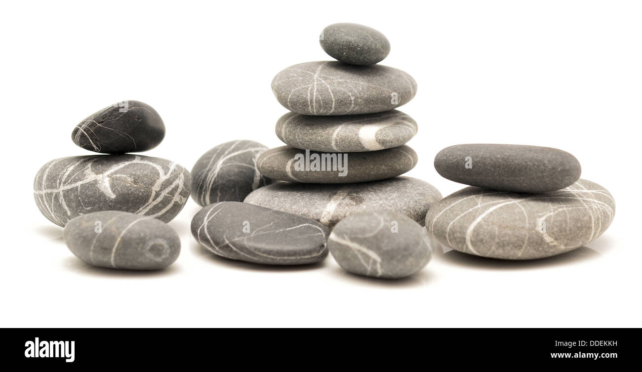 balancing pebbles isolated on white background Stock Photo - Alamy