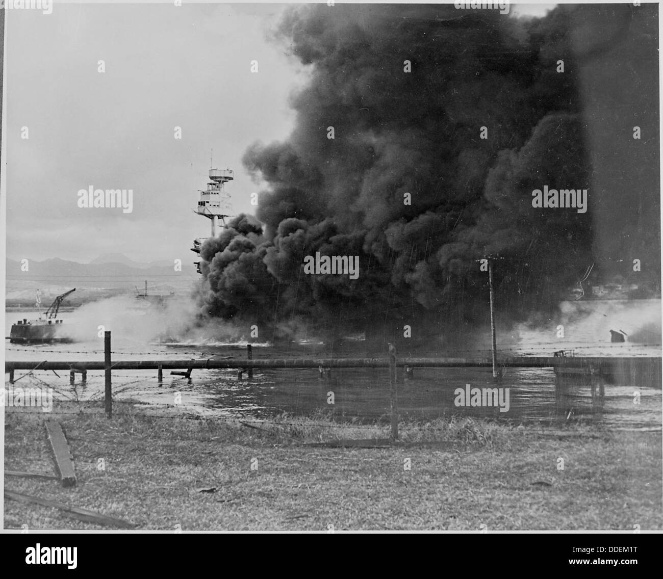 A naval photograph documenting the Japanese attack on Pearl Harbor ...