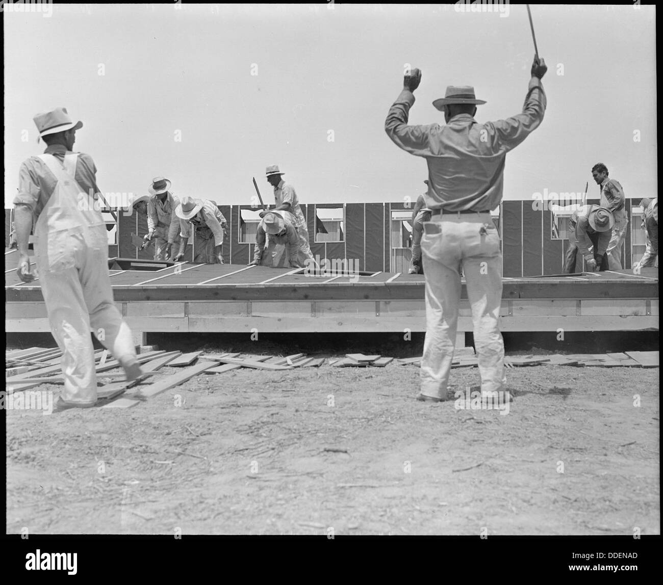 This photograph depicts the construction of buildings for Japanese ...