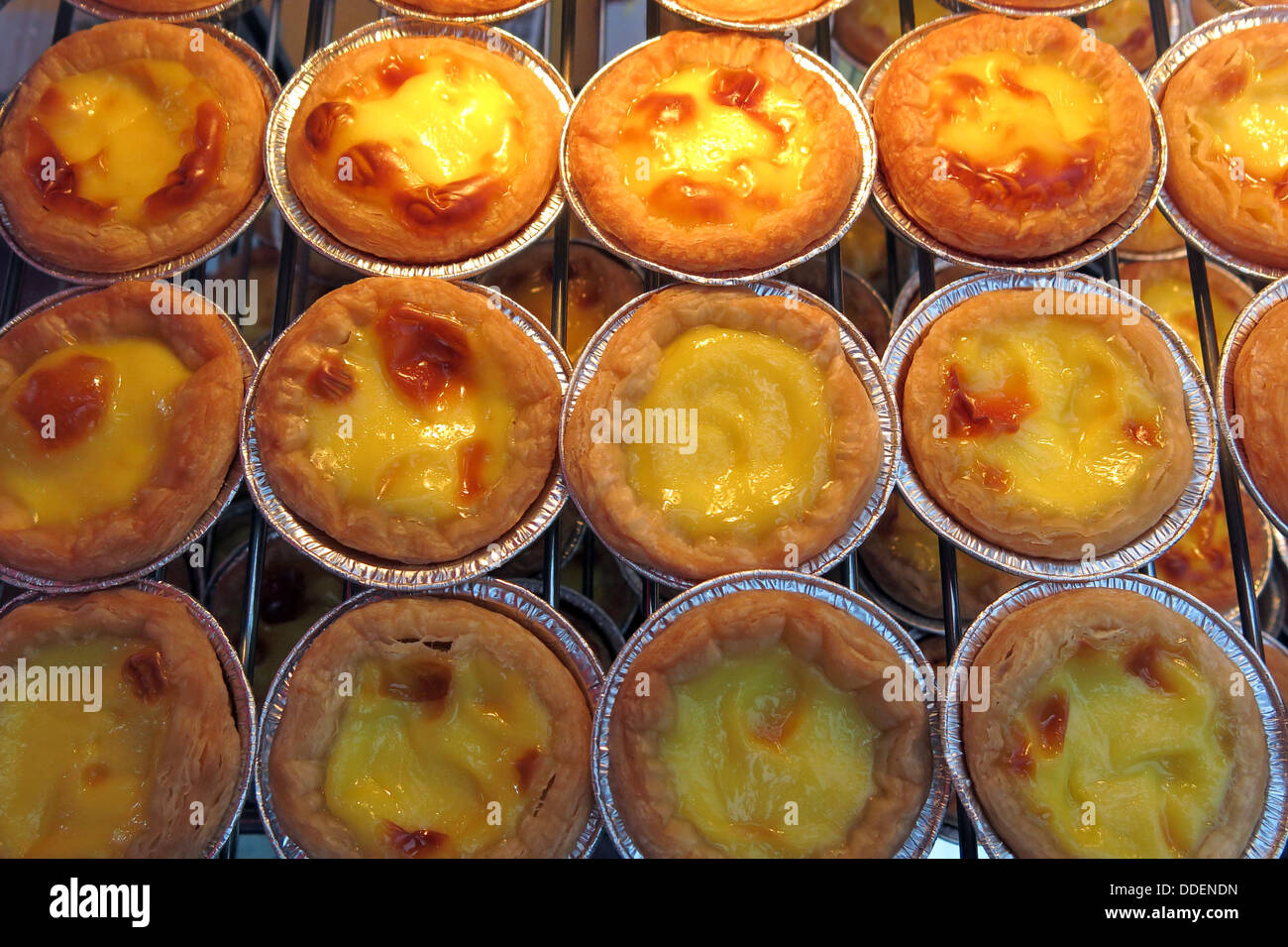 Melaka Portuguese egg tarts Stock Photo - Alamy