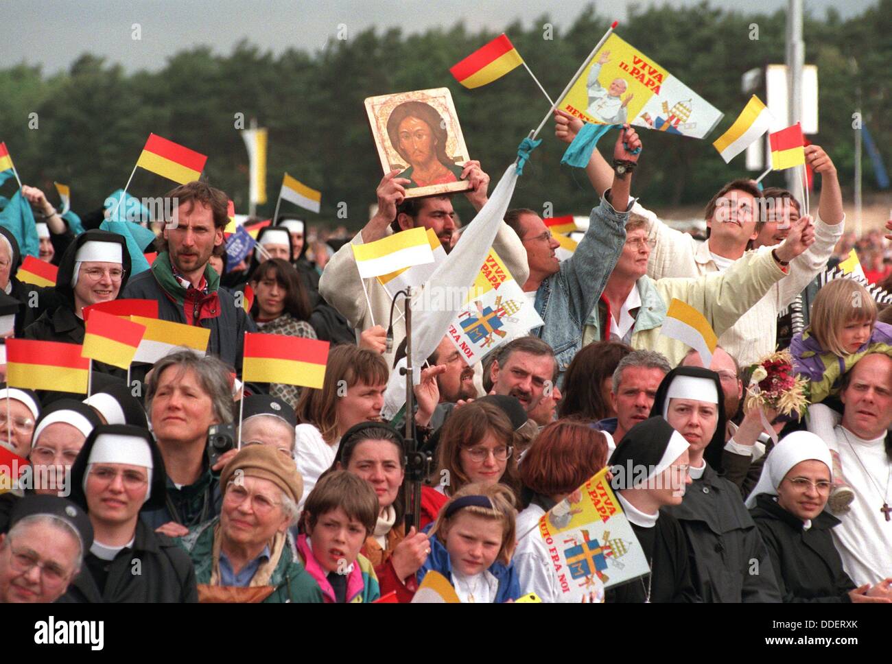 Waving and dancing people during the mass with Pope John Paul II. on ...