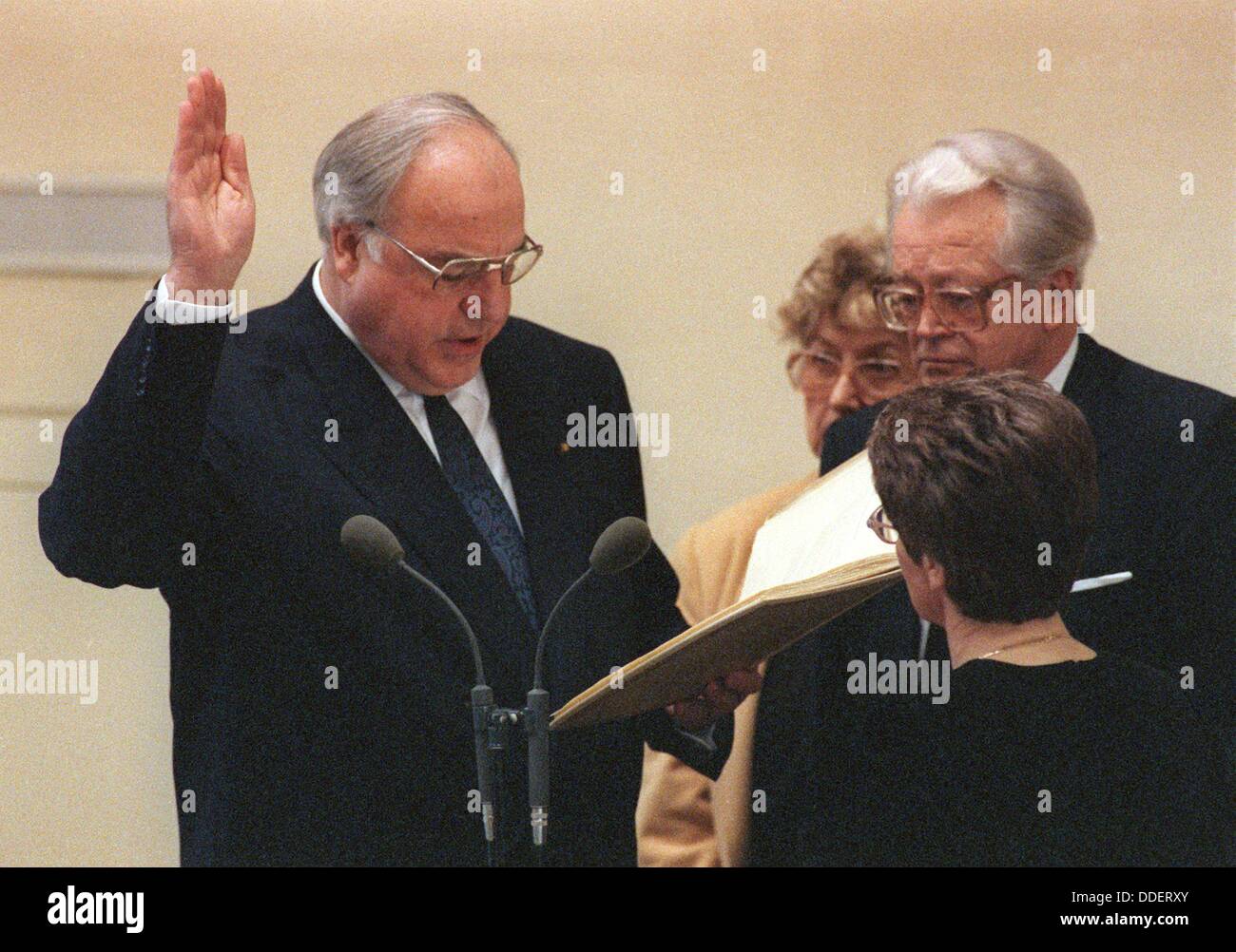 The German Chancellor Helmut Kohl is sworn in by the President of the ...