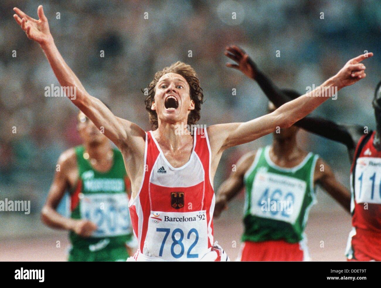 Dieter Baumann cheers after his victory of the 5,000 metres final at ...