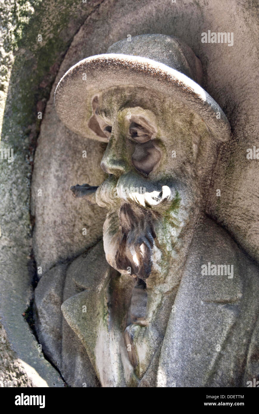 bas-relief of a man with berad on a grave at the Monumental Cemetery in ...