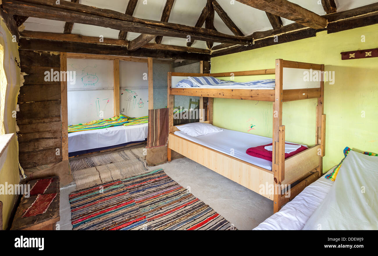 Interior of a wooden house, traditional Serbian style Stock Photo - Alamy
