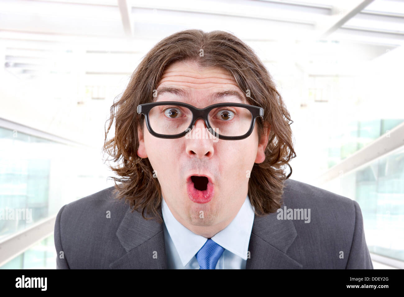 happy silly young businessman at the office Stock Photo - Alamy