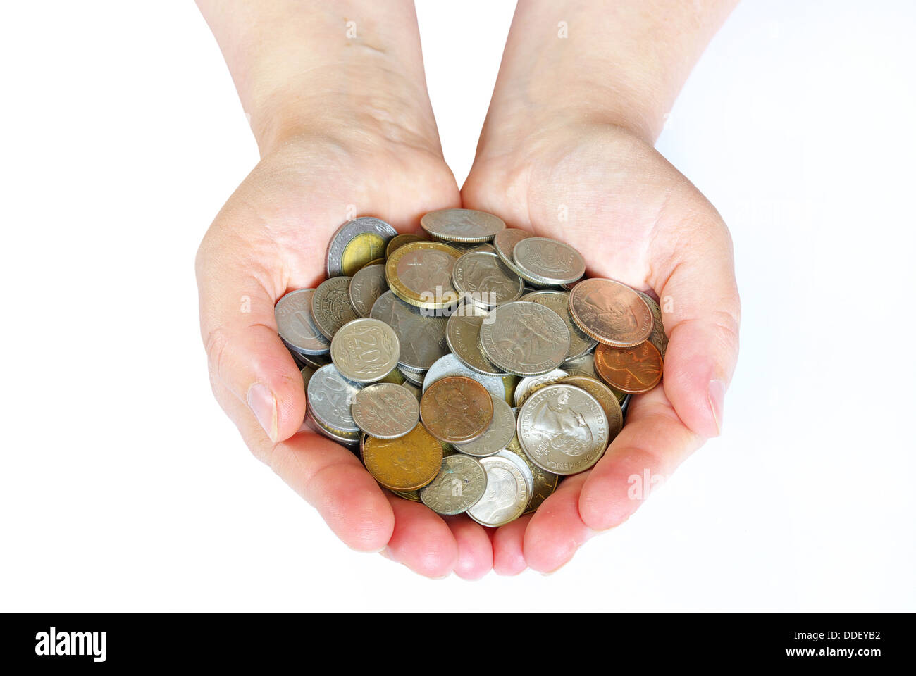 Hands holding coins Cut Out Stock Images & Pictures - Alamy