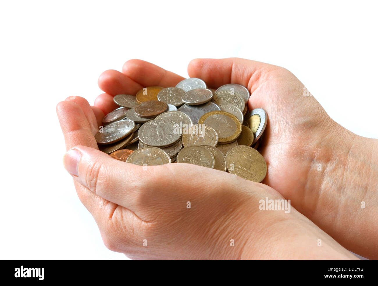Hands holding coins Stock Photo - Alamy