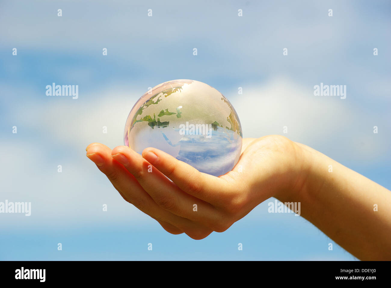 globe in hand Stock Photo - Alamy