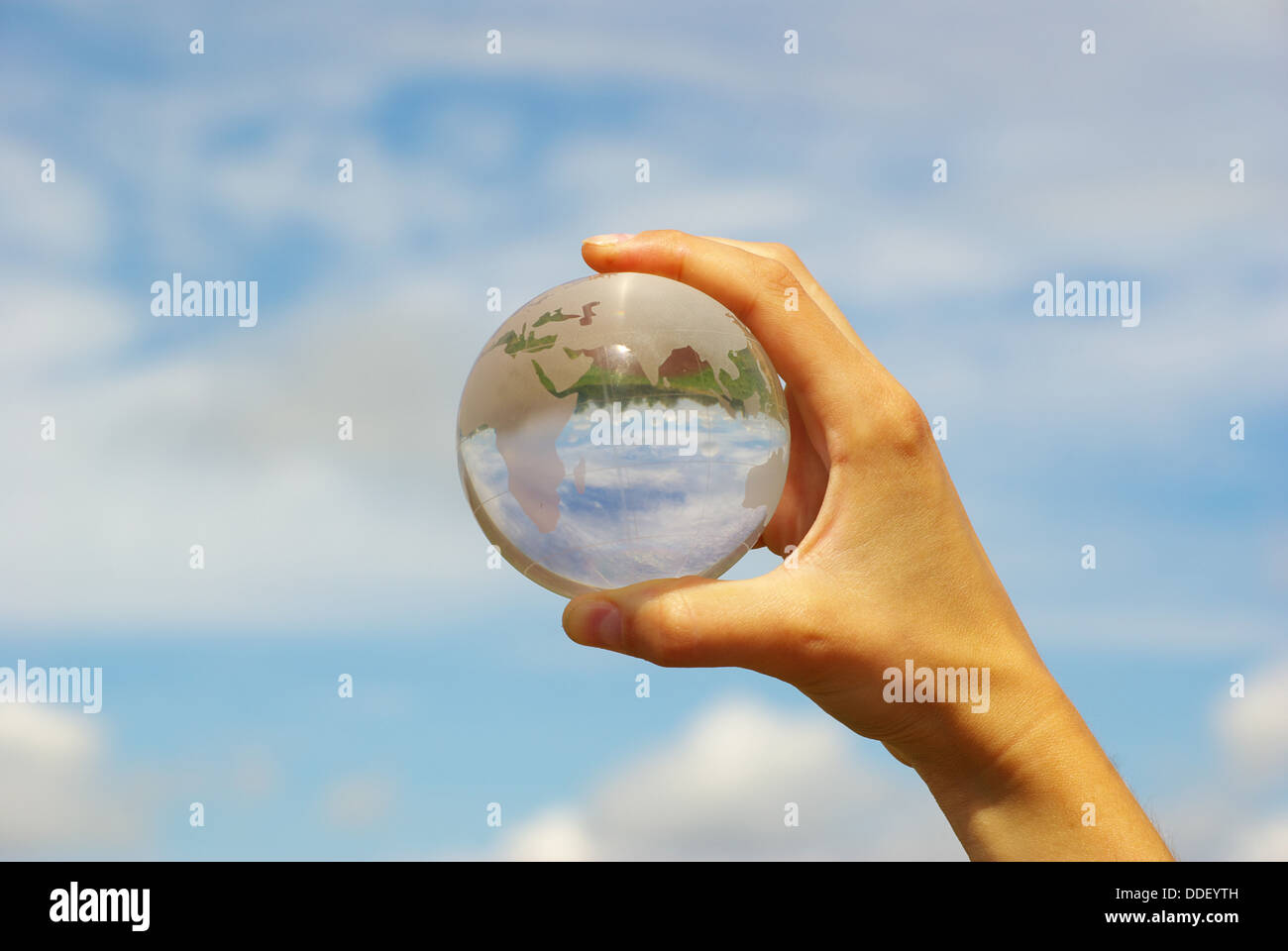 globe in hand Stock Photo - Alamy