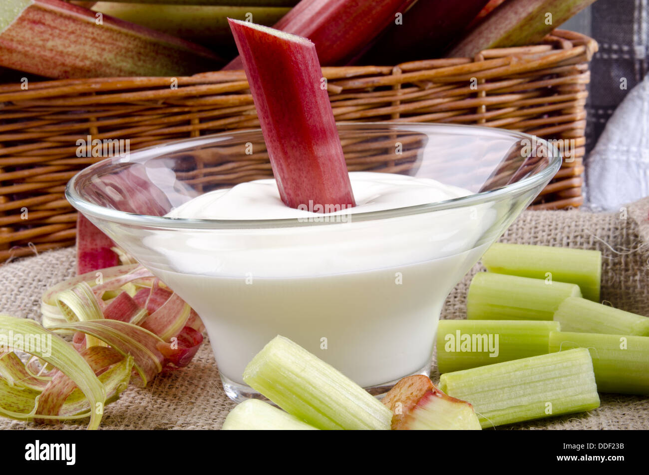 freshly cut rhubarb with yogurt Stock Photo - Alamy
