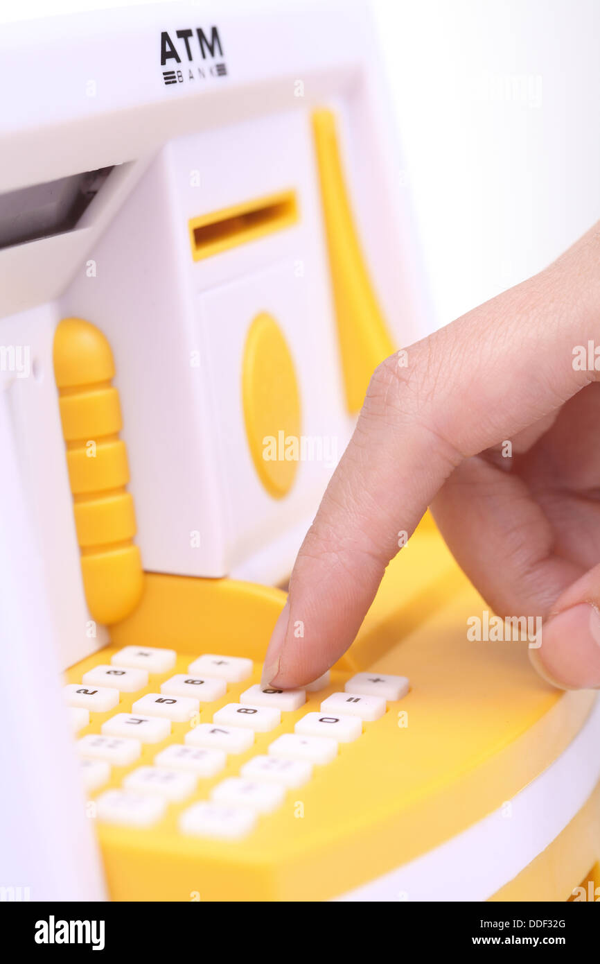 Hand press ATM keyboard Stock Photo - Alamy
