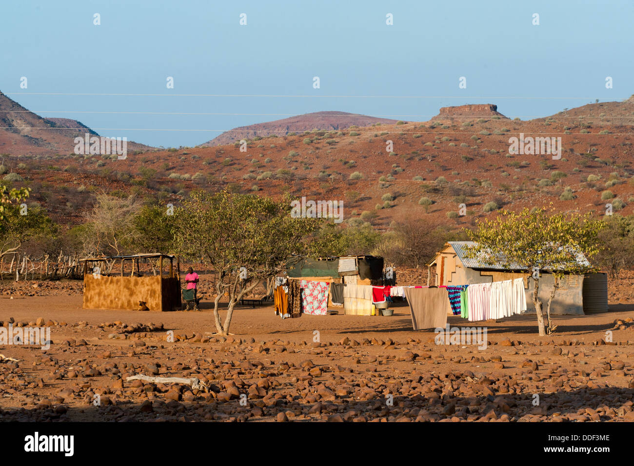 Farmstead with laundry hanging to dry set in a dry landscape, Kunene ...