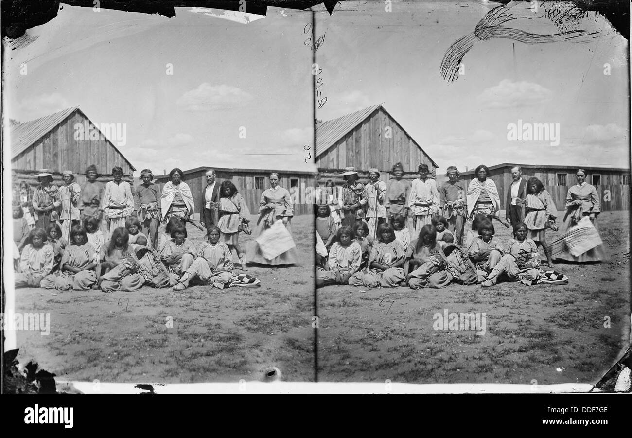 A historical photograph showing a group of Coyotero Apache and their ...