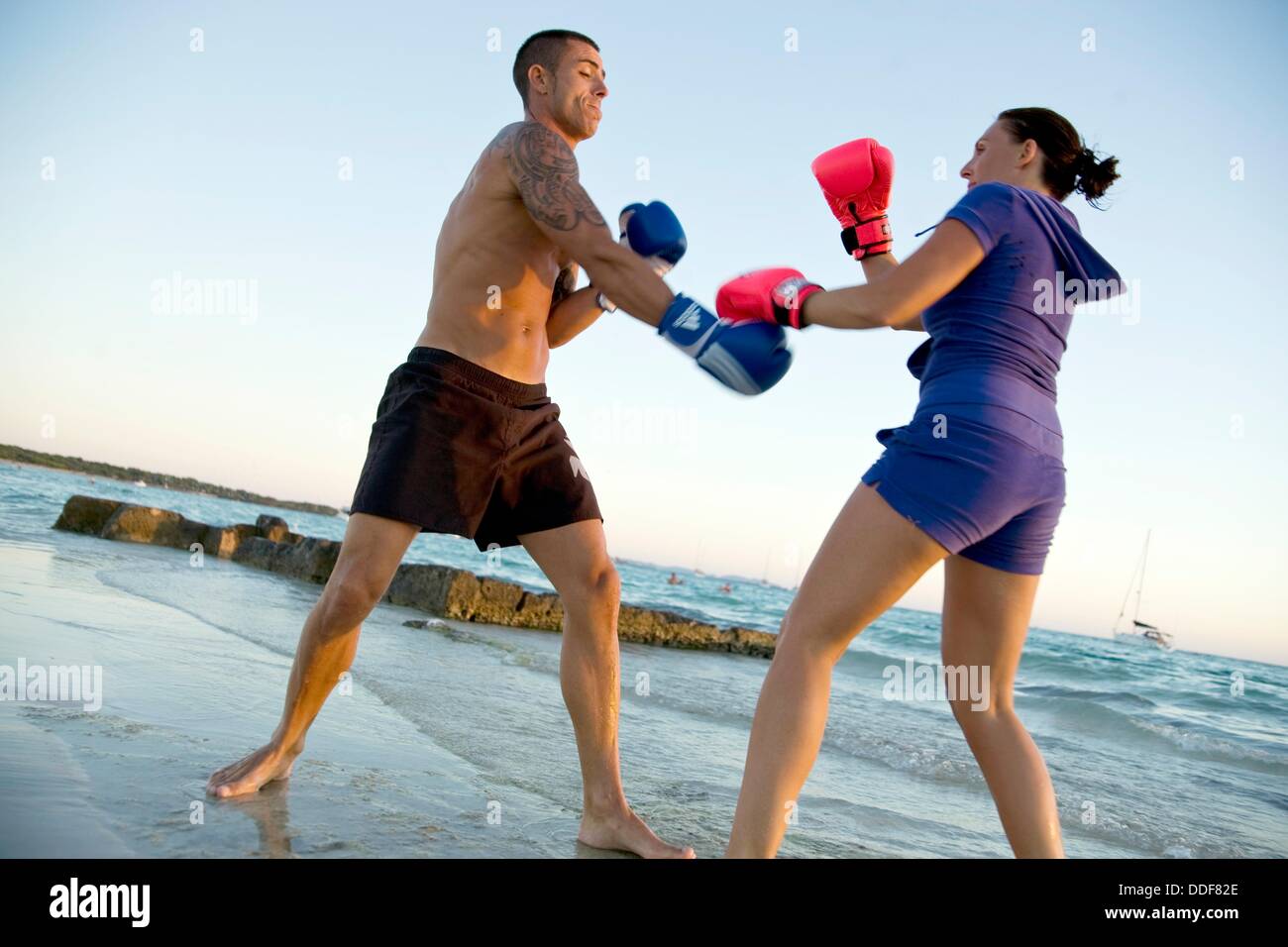 Female boxing on the beach hi-res stock photography and images - Alamy