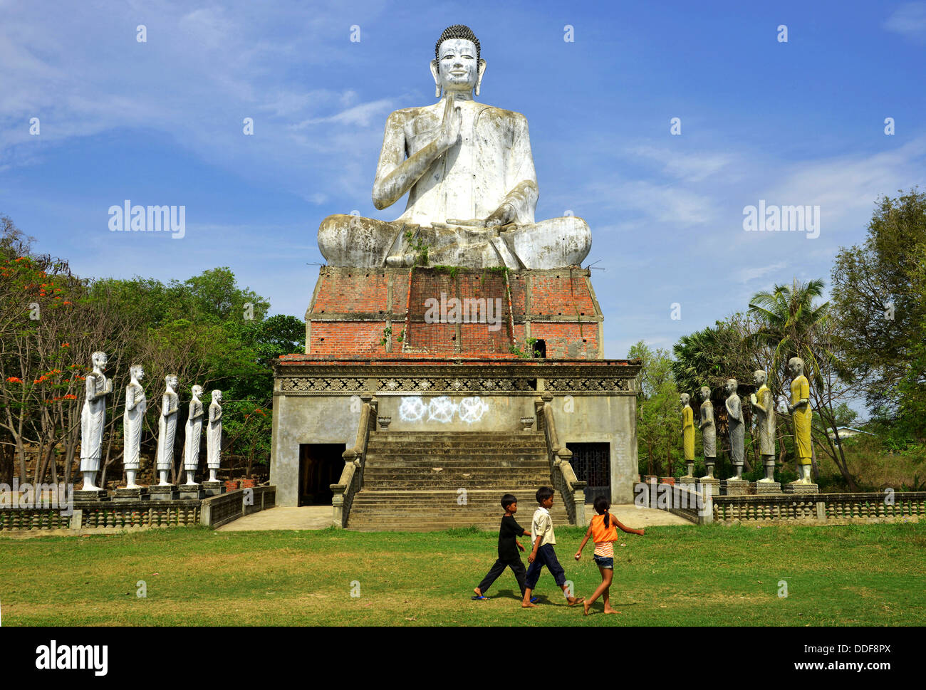 Giant Buddha statue at Wat Ek Phnom temple near the city of Battambang ...