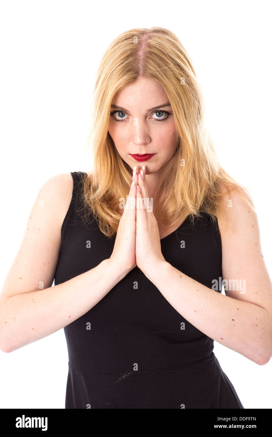 Model Released. Attractive Young Woman Praying Stock Photo - Alamy