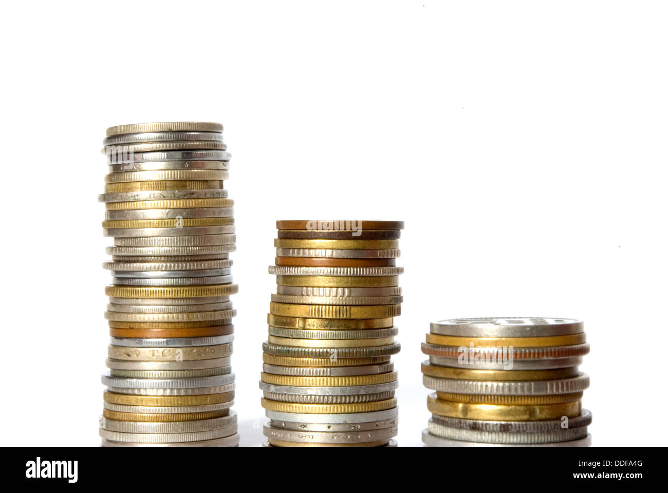 three towers of coins Stock Photo - Alamy