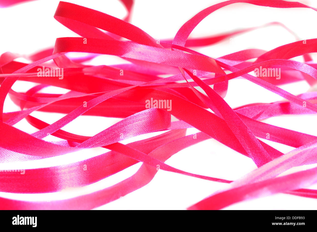 Decorative pink ribbon isolated on a white background Stock Photo - Alamy