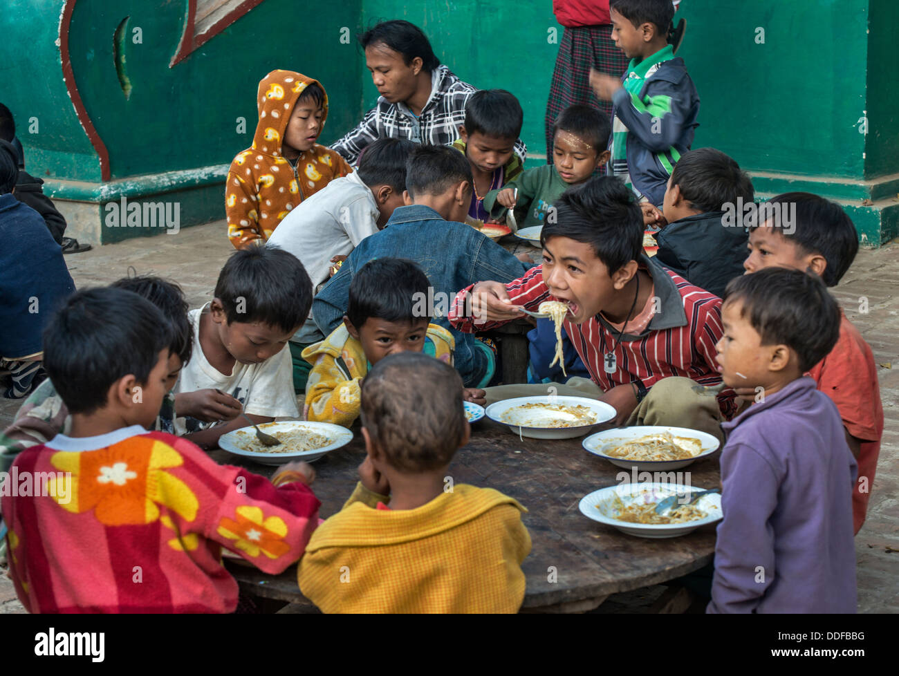 Burmese children having a meal in a pagoda Bagan Myanmar Stock Photo ...