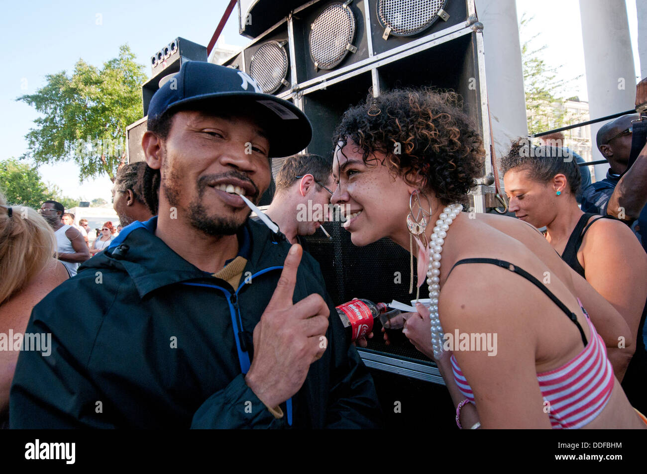 Young people smoking cannabis at street festival Notting hill West ...