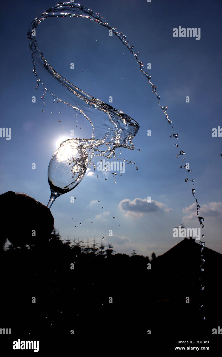 Splash water from glass hi-res stock photography and images - Alamy