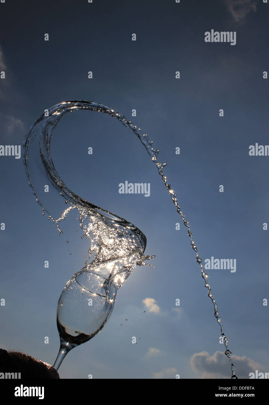 Water splashing from wine glass Stock Photo - Alamy