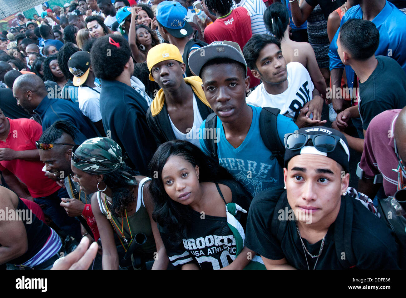 Large multiracial crowd people listening hi-res stock photography and ...