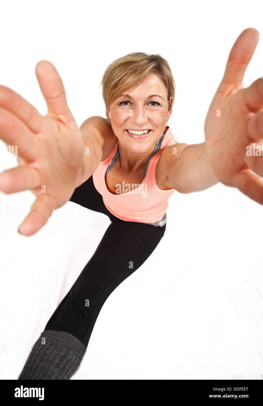 Cute woman at fitness isolated white background Stock Photo - Alamy