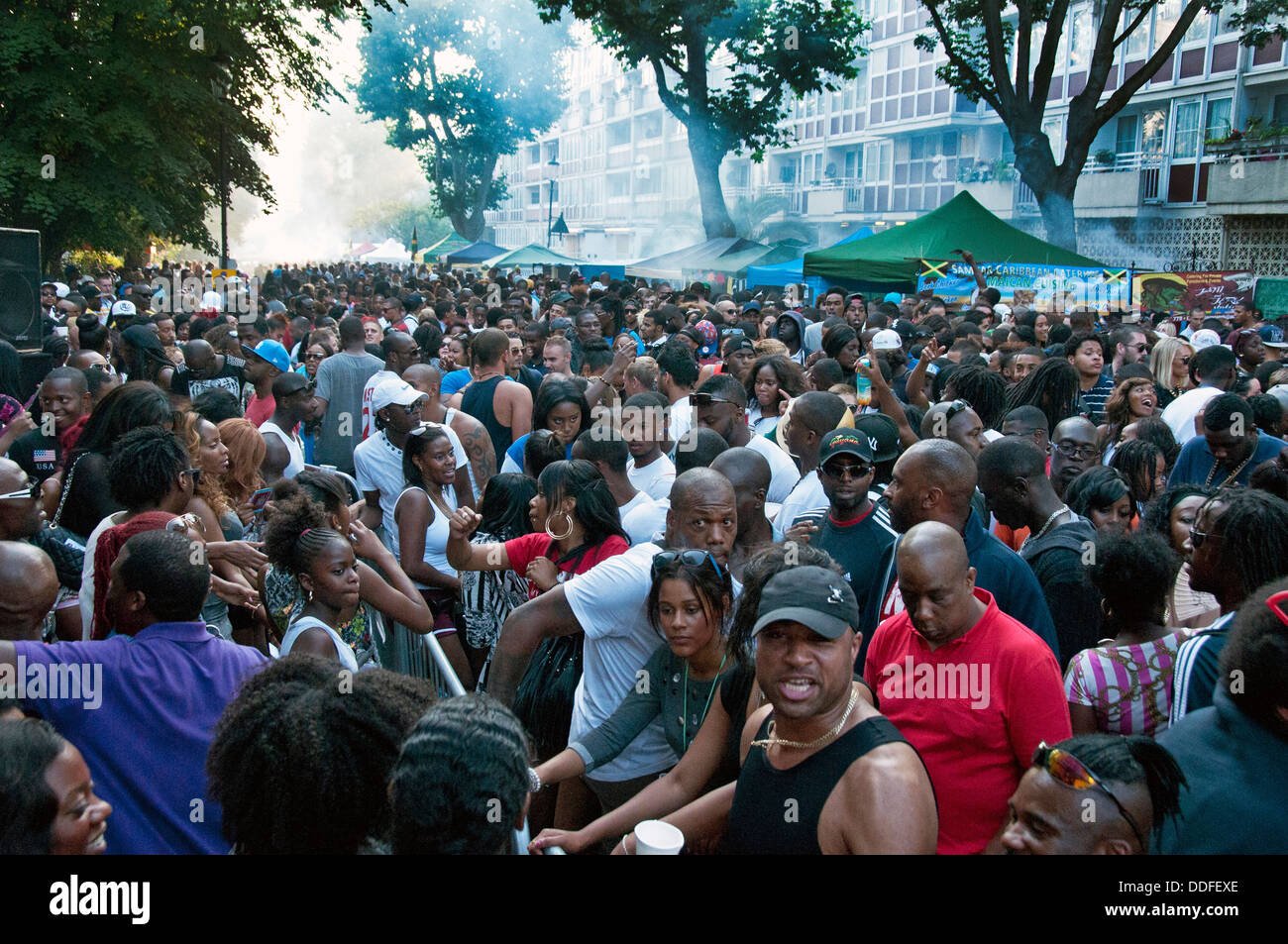 Large multiracial crowd people listening hi-res stock photography and ...