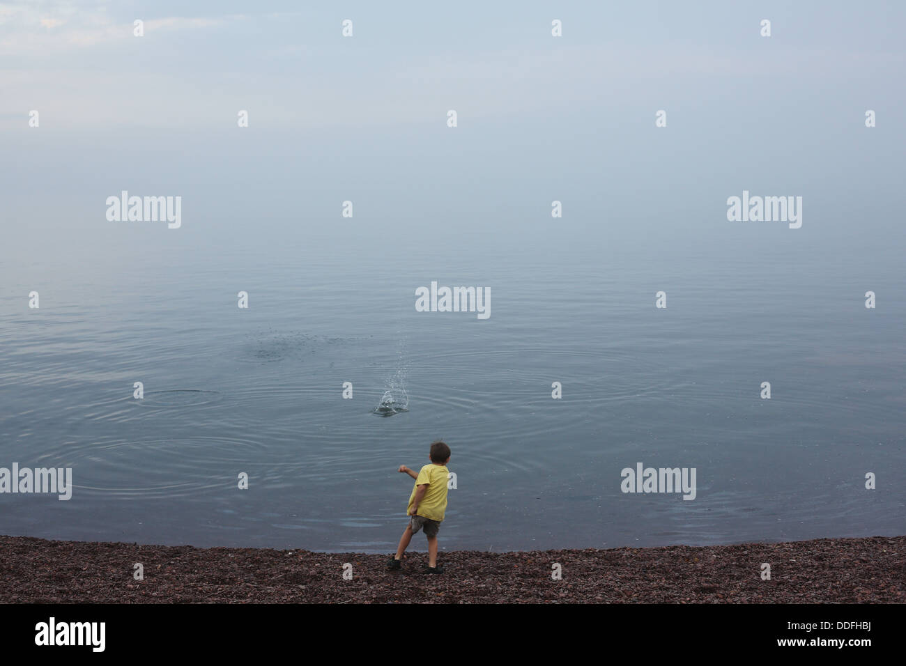Throwing Rock In Water High Resolution Stock Photography and Images - Alamy