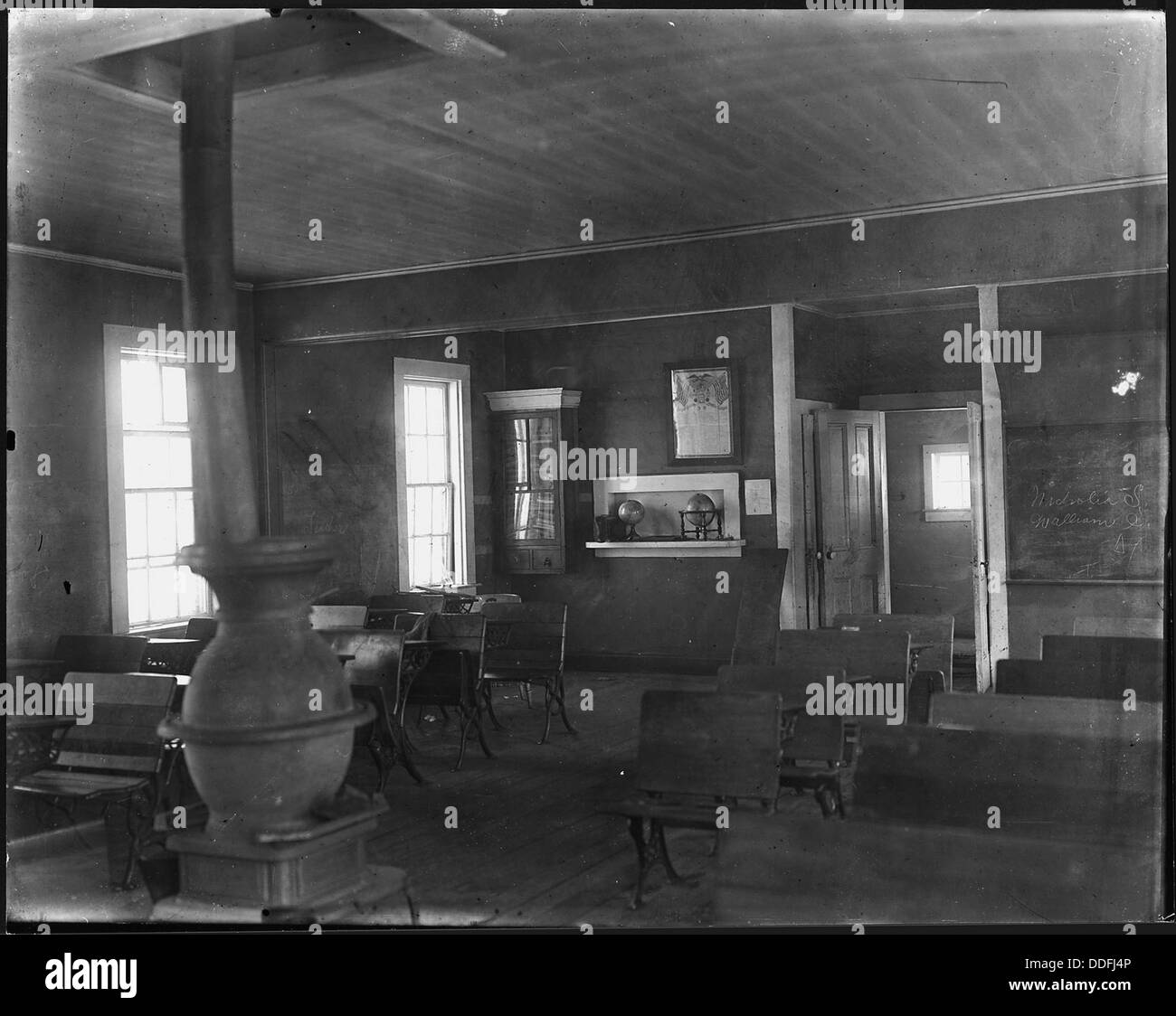 An exterior view of a traditional schoolhouse, reflecting the ...