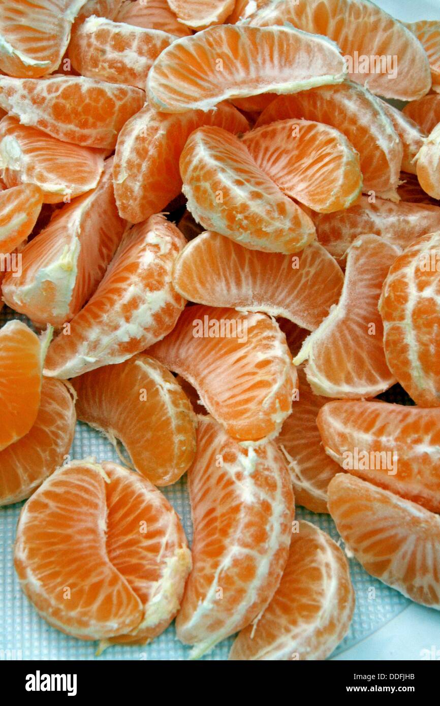 Mandarin wedges hi-res stock photography and images - Alamy
