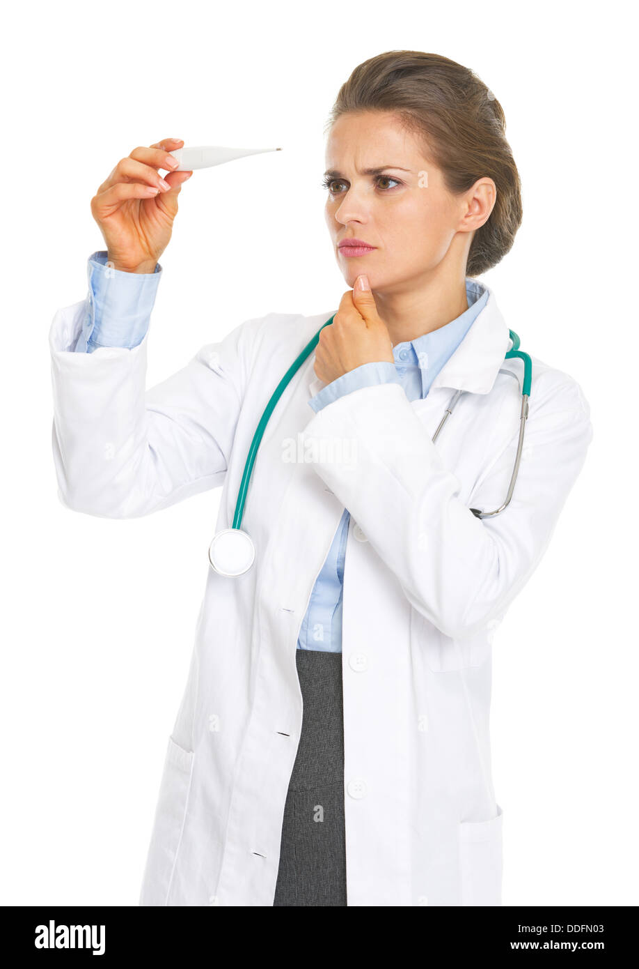 Concerned doctor woman looking on thermometer Stock Photo - Alamy