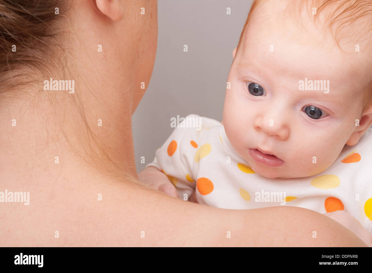 Mother from Behind Holding Newborn Baby Stock Photo - Alamy
