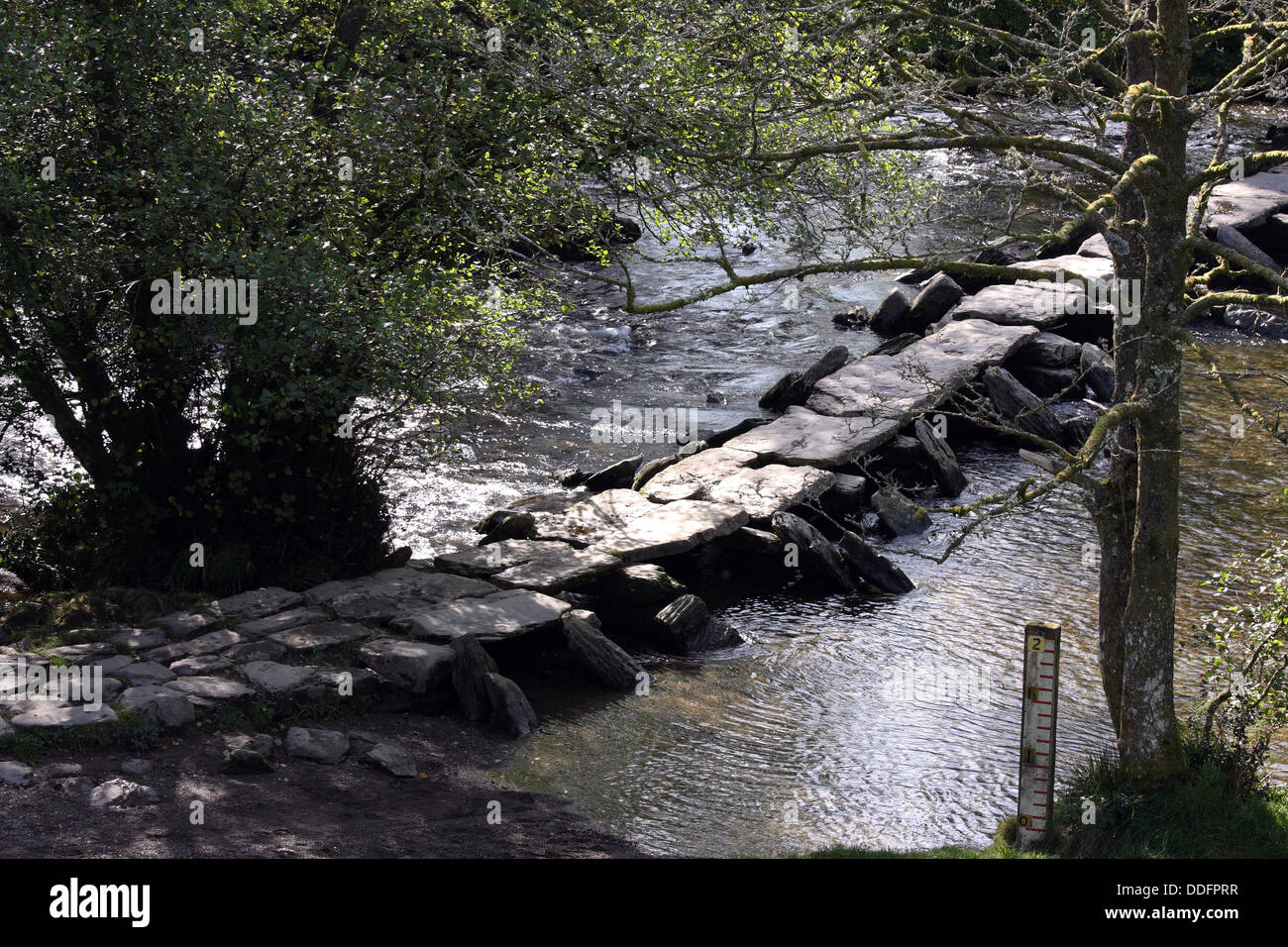 Tarr steps clapper bridge, Exmoor, England, UK. River Barle in the ...