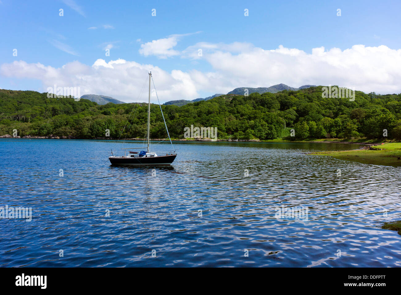 Small boat in bay, yacht, blue sea and sky, Gairloch, Northwest ...